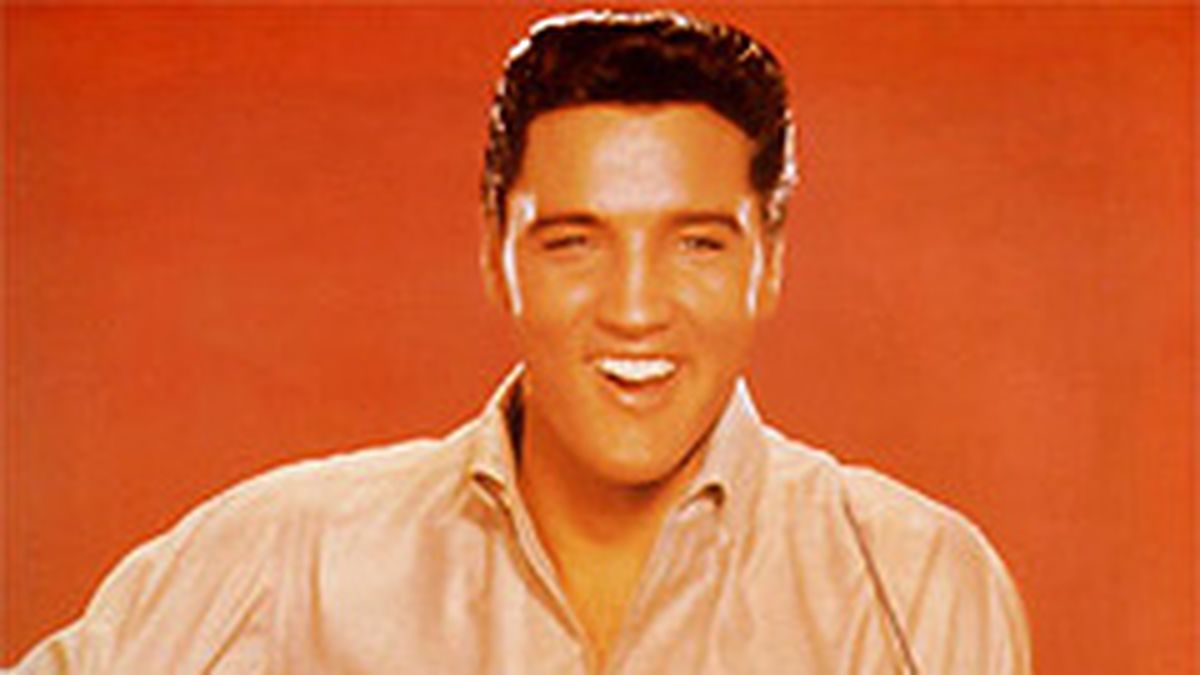 Elvis Presley Sosteniendo Dinero